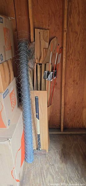 Corded electric chainsaw, yard tools, chicken wire and wood | Maxsold