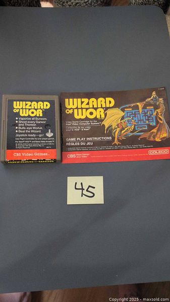Atari 2600 Wizard of Wor cartridge and manual | Maxsold