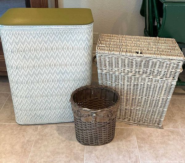 Two wicker laundry hampers and waste bin | Maxsold