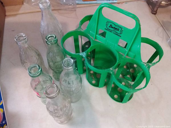 6 Coca-Cola bottles with Becker's carrier | Maxsold