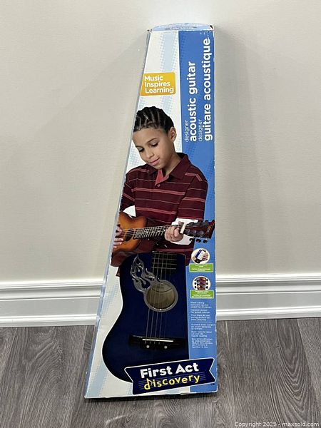 First Act Discovery blue childrens acoustic guitar | Maxsold