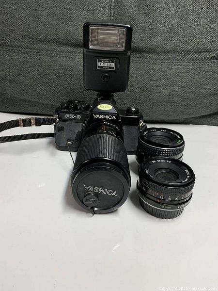 Yashica FX-3 35mm SLR camera, CS-201 flash, 3 lenses | Maxsold