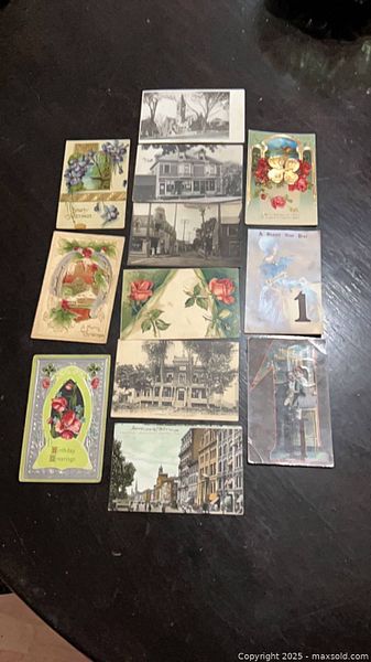 Twelve antique used postcards with postmarks | Maxsold