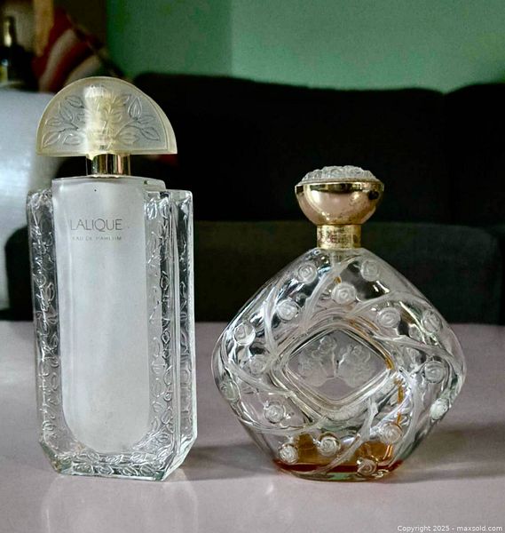 Two Lalique empty crystal perfume bottles | Maxsold