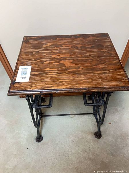 Cast iron treadle sewing base wood table | Maxsold