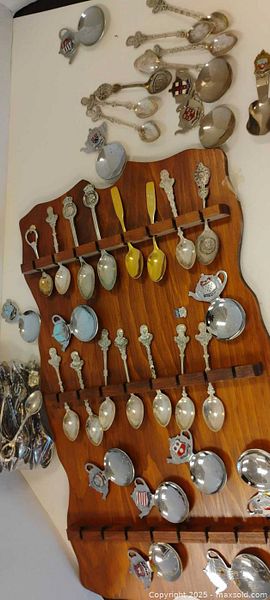 Souvenir collector spoons and wooden rack | Maxsold