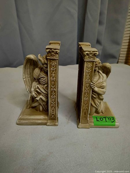 Angels & Demons limited edition bookends | Maxsold