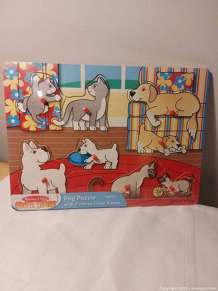 Melissa & Doug wooden dog peg puzzle | Maxsold
