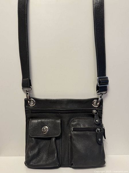 Roots Tribe Village Prince leather crossbody bag | Maxsold