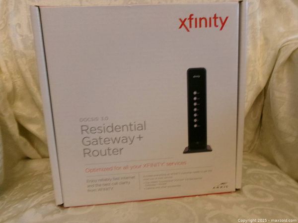 Xfinity DOCSIS 3.0 Residential Gateway Router with cords | Maxsold