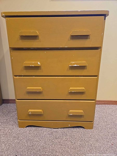 Mustard yellow 4-drawer wood dresser | Maxsold