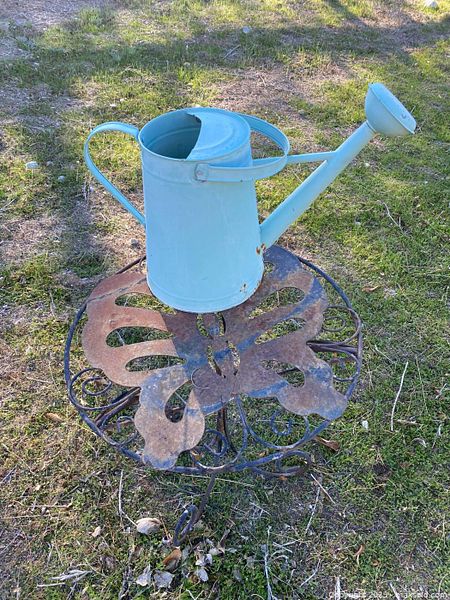 Metal Watering Can and Butterfly Table | Maxsold