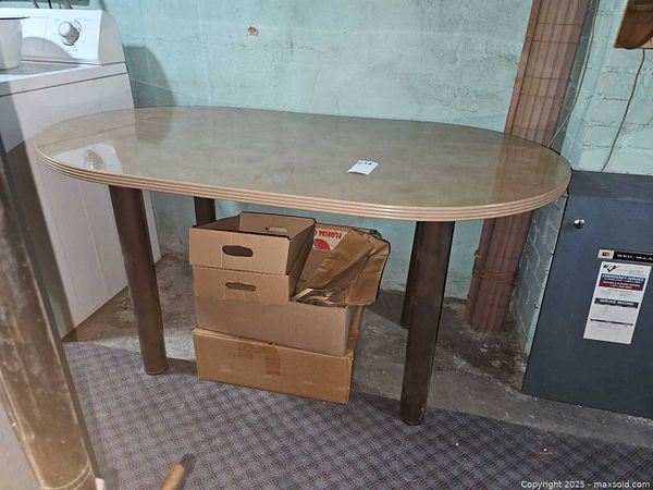 Vintage oval Formica dining table | Maxsold