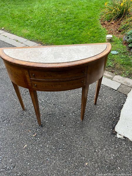 Half-moon wood console table with stone top | Maxsold