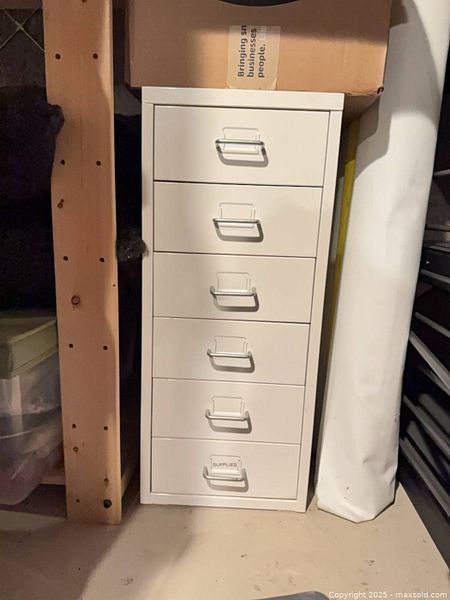 White metal 5-drawer storage unit | Maxsold