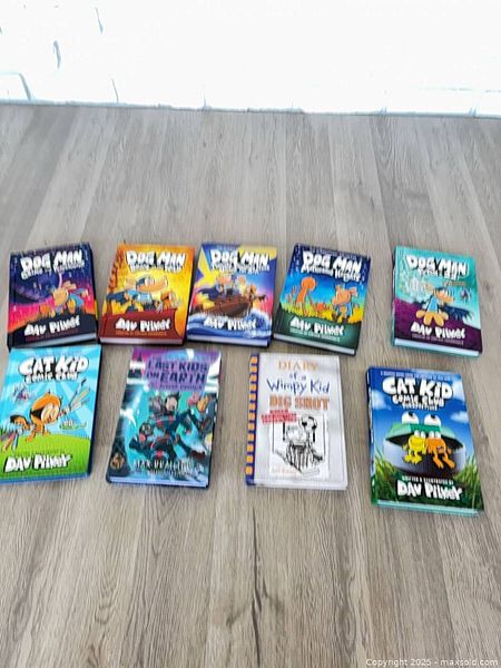 9 hardcover children’s books – Dog Man, Cat Kid, Wimpy Kid | Maxsold