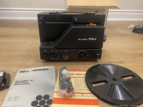 Bell & Howell 11XJ Super 8 sound projector with box, microphone, reel ...