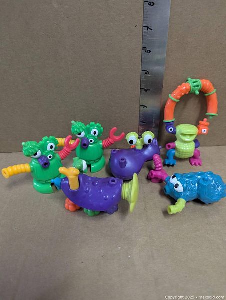 Large lot Nickelodeon Tangle Twist-a-Zoid toys 1996 | Maxsold
