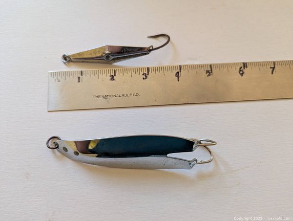 Two vintage metal fishing lures | Maxsold