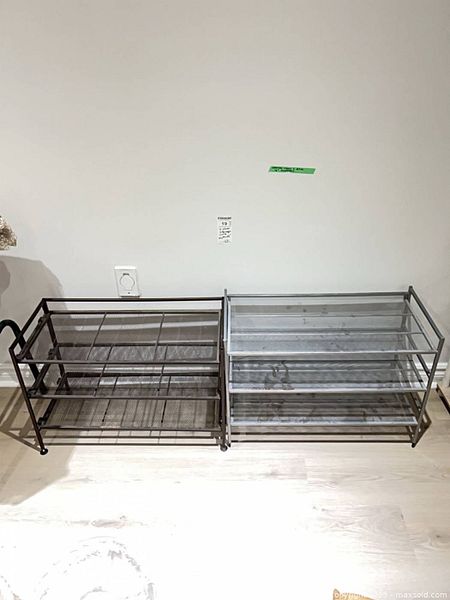 Pair metal 3-tier mesh shoe racks on casters | Maxsold