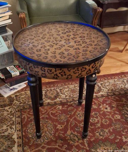 Round leopard print accent table | Maxsold