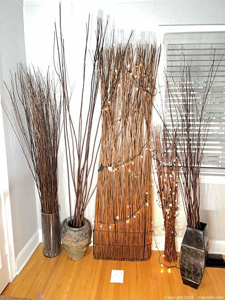 Decorative twig bundles with string lights | Maxsold