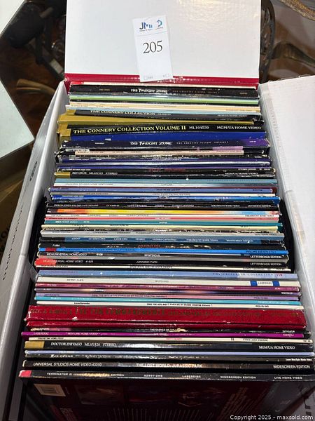 Laserdiscs and vinyl record albums | Maxsold