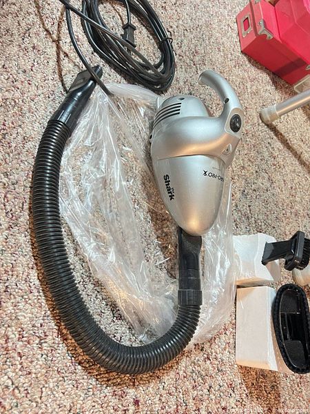 Shark Euro-Pro X handheld vacuum with 2 attachments | Maxsold