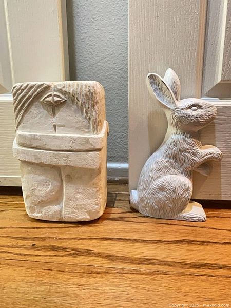 The Kiss sculpture reproduction and rabbit doorstop | Maxsold