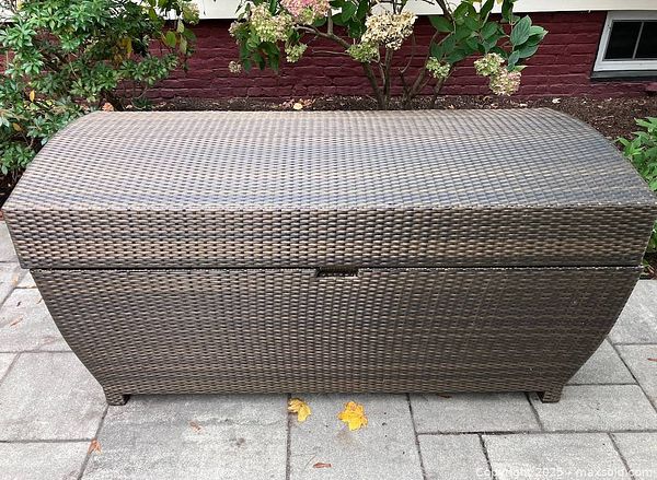 Frontgate all-weather resin wicker storage bin with cover | Maxsold