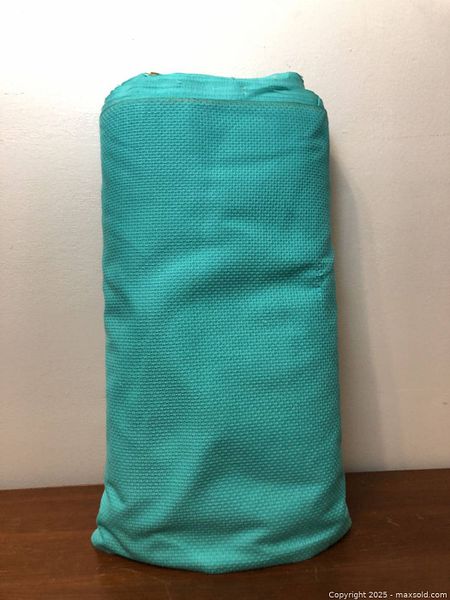 Bolt of turquoise waffle-weave fabric | Maxsold