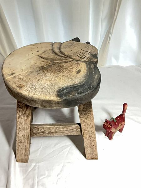Wooden cat carved stool and red cat figurine | Maxsold