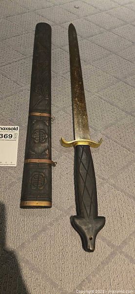 Carved wood short sword with sheath | Maxsold