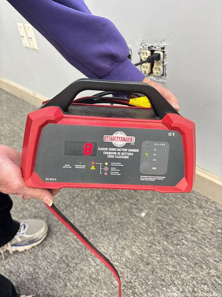 MotoMaster 12V and 24V battery chargers with manual double-barrel foot ...