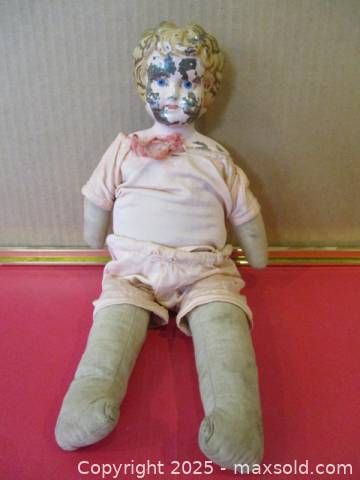 1860s steel head and torso child doll | Maxsold