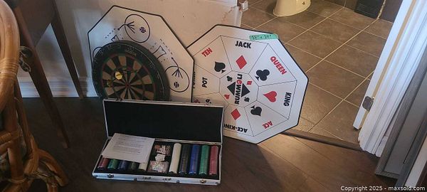 Poker chip set with case and Nodor dartboard | Maxsold