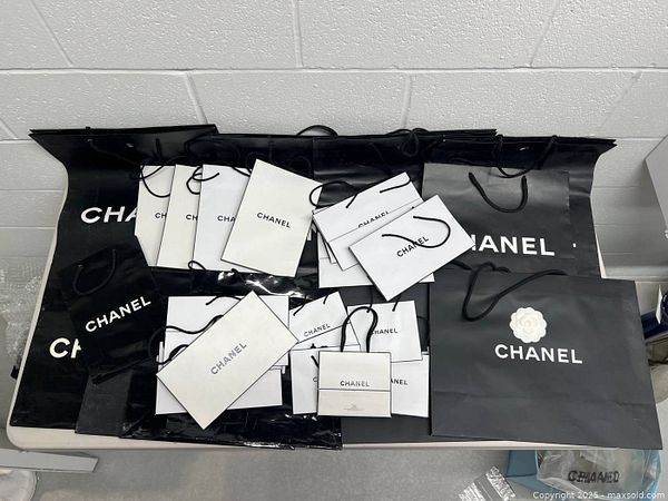 Chanel black and white paper shopping bags collection | Maxsold