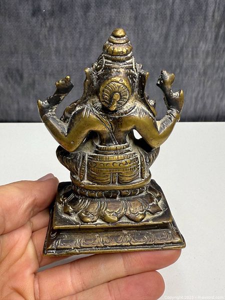 Antique solid brass goddess figure | Maxsold