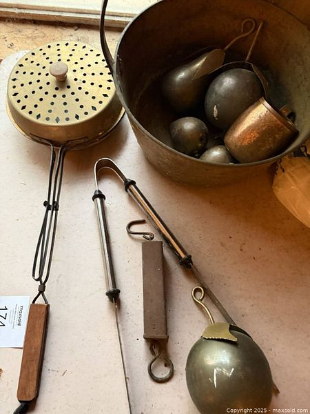 Vintage mixed-metal kitchen tools and fruit ornaments | Maxsold
