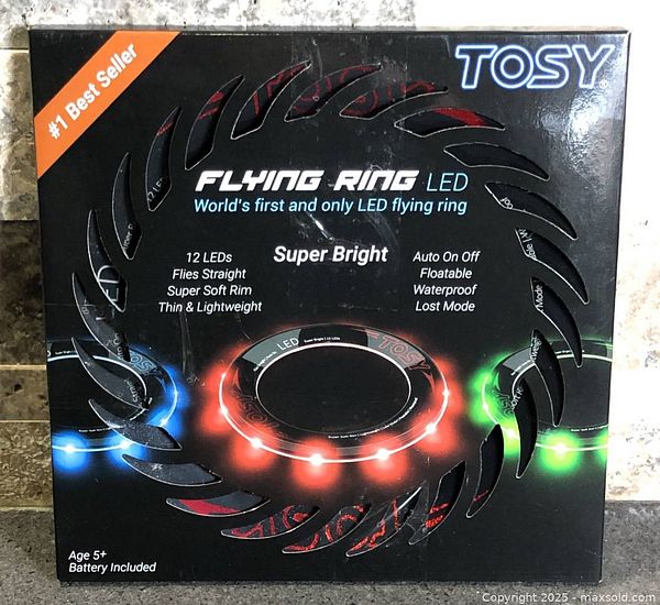 Tosy Flying Ring LED toy new in box | Maxsold