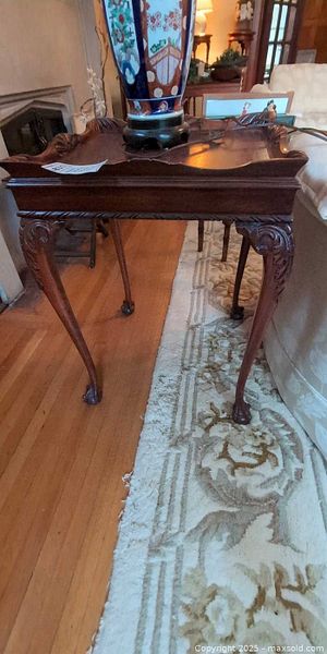 Carved hardwood Chippendale side table | Maxsold