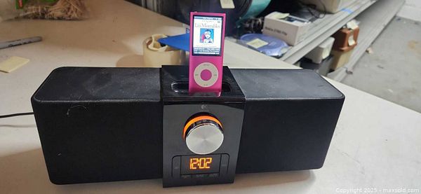 Logitech speaker dock and 16GB pink iPod Nano | Maxsold