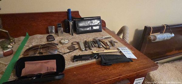 Pocket knives, lighters, wallets, sunglasses, Marathon pocket watch ...
