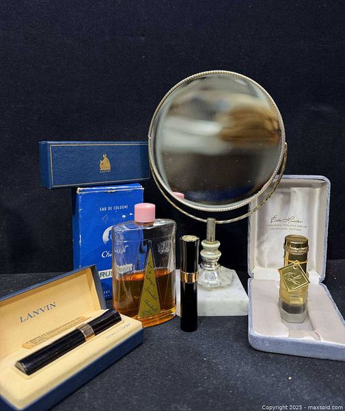 Vanity mirror with Lanvin perfume atomizer and assorted vintage perfume ...