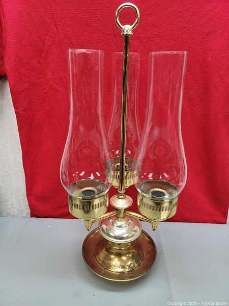 Vintage solid brass three-light hurricane candelabra | Maxsold