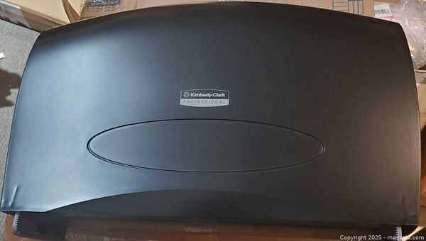 Kimberly-Clark Professional jumbo roll toilet paper dispenser | Maxsold