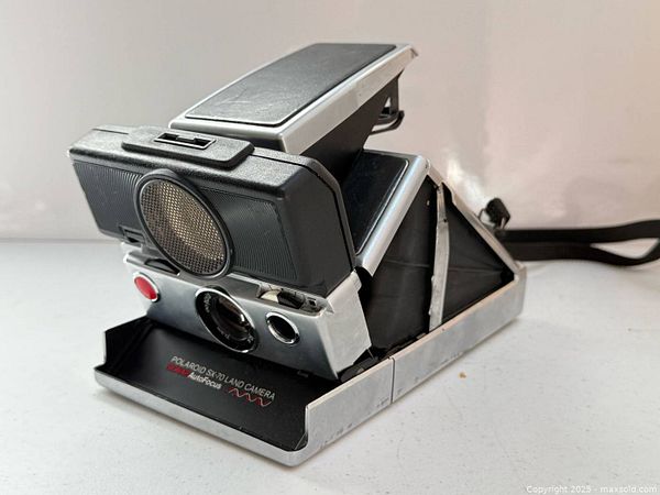 Polaroid SX-70 Sonar Autofocus Folding Camera | Maxsold