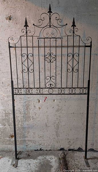 Wrought iron display piece with footed base | Maxsold