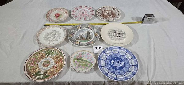 Nine vintage calendar plates 1909-1960s | Maxsold