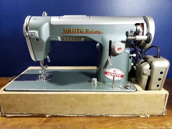 White Rotary electric sewing machine | Maxsold
